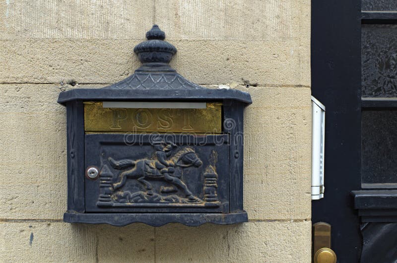 Old Post Box on White Plaster Texture Wall in Germany. Metal Mailbox ...