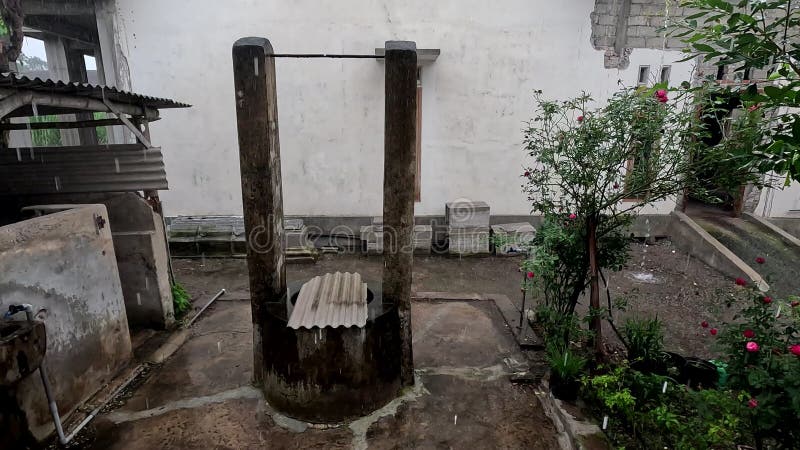 Traditional Well in the Village with Rain in the Morning Stock Footage ...