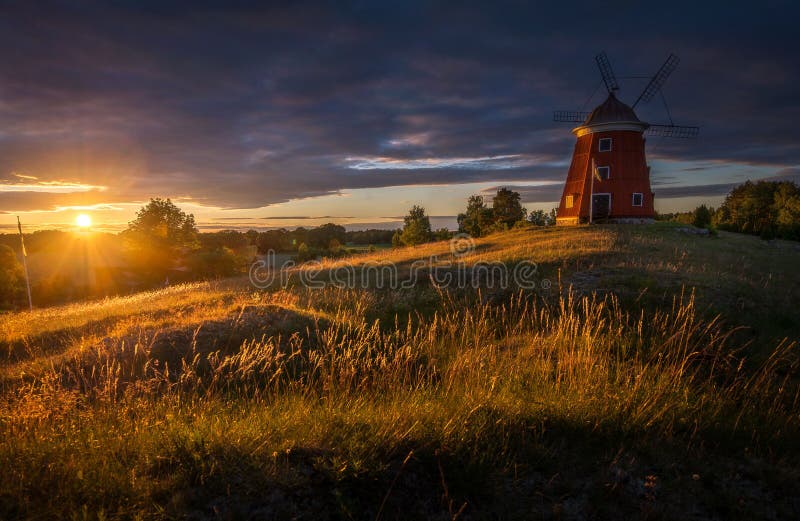Traditional Windmill in the Field at Sunset Stock Image - Image of ...