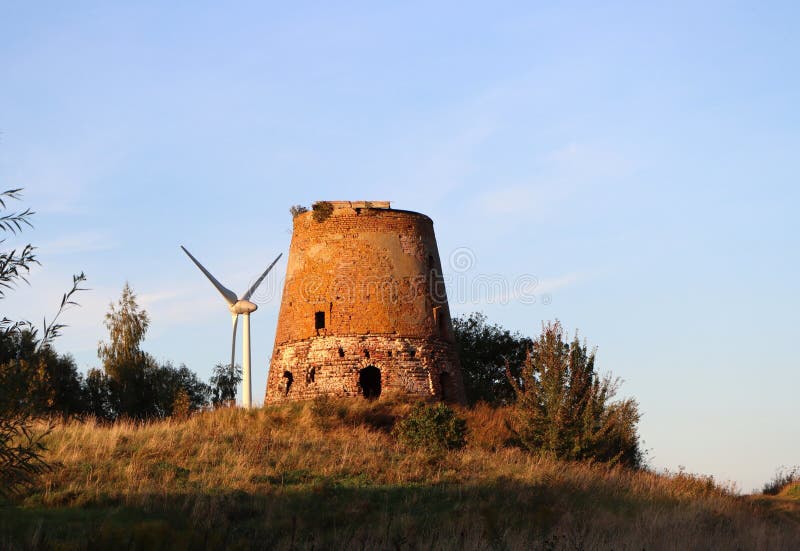 Traditional Windmill and Modern Wind Turbine Stock Image - Image of ...
