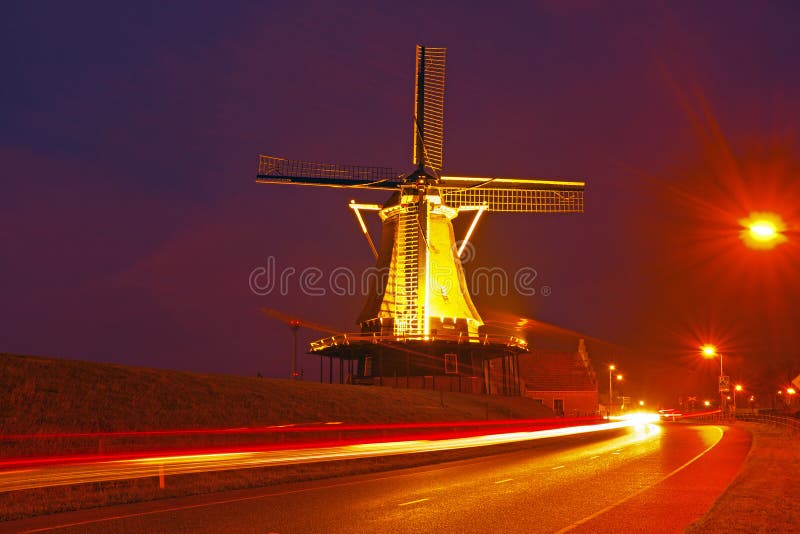 An Old Windmill in the Night with Clouds Stock Photo - Image of night ...