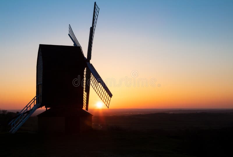 Traditional Windmill at Sunset Stock Photo - Image of hills, peaceful ...