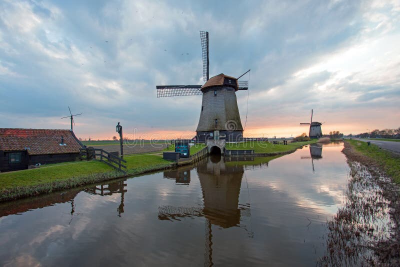 Traditional Windmills in a Dutch Landscape in Netherlands Stock Photo ...