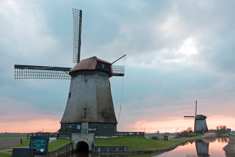 Traditional Windmills in a Dutch Landscape in Netherlands Stock Image ...