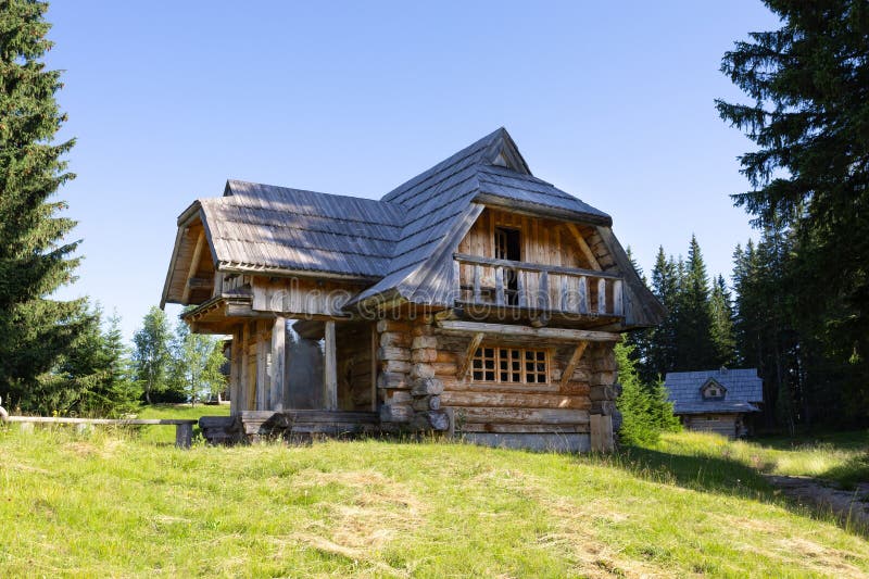 Traditional Wooden House in the Forest Stock Photo - Image of ...