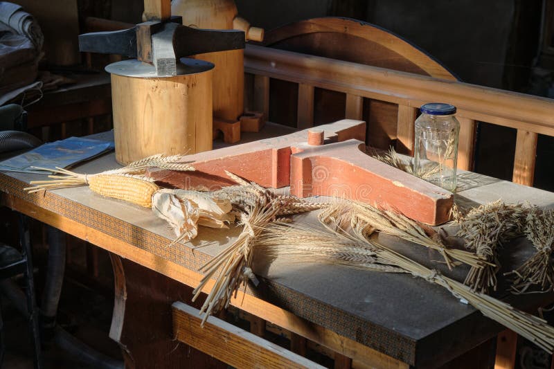 Traditional Wooden Rind Forms and Grain Display in a Historic Mill ...