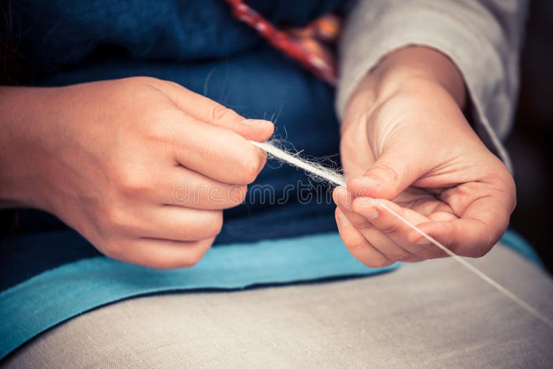 Traditional wool spinning stock image. Image of woman - 218465561