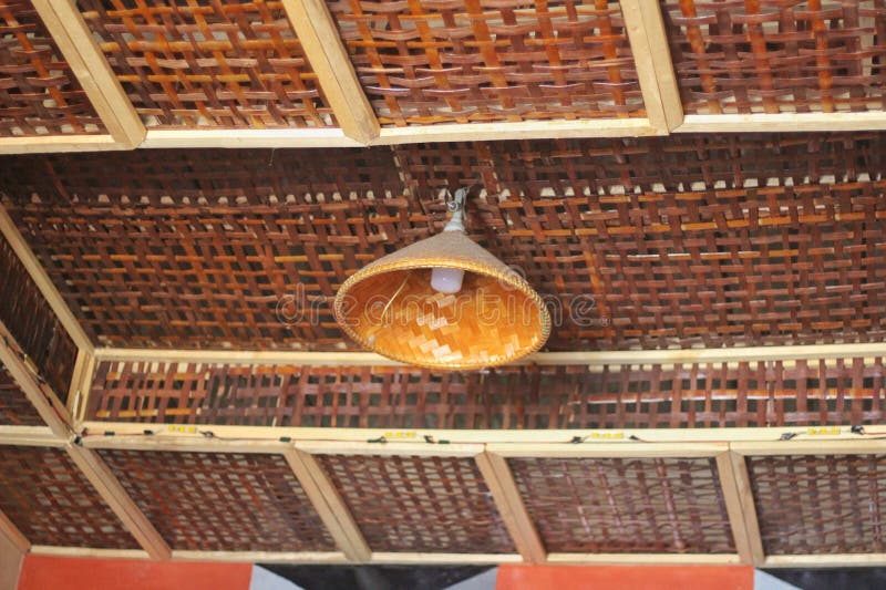 Traditional Woven Bamboo Ceiling with Basket Lamp Stock Image - Image ...