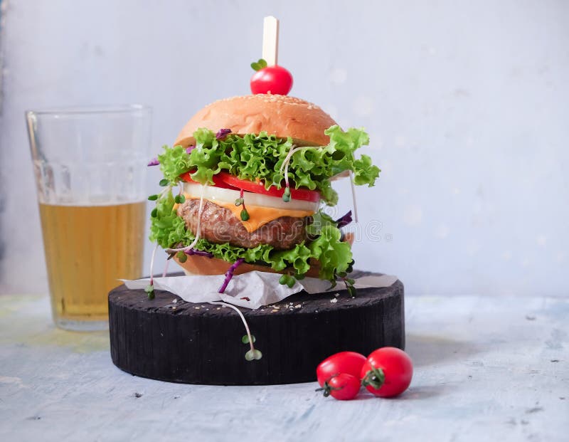 A Cheeseburger is a Hamburger Topped with Cheese Stock Image - Image of ...