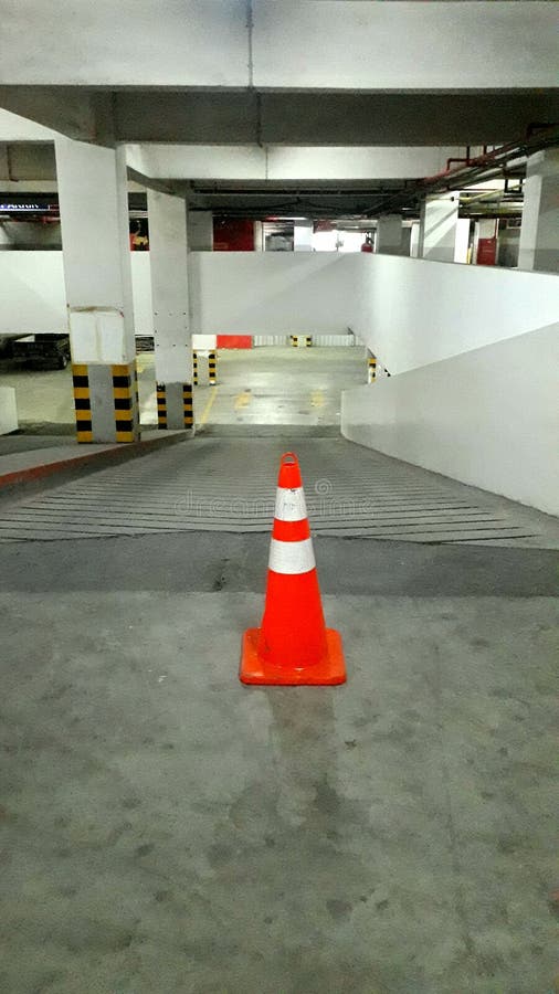 Traffic Cone on Down Road at Basement Floor Stock Image - Image of tile ...