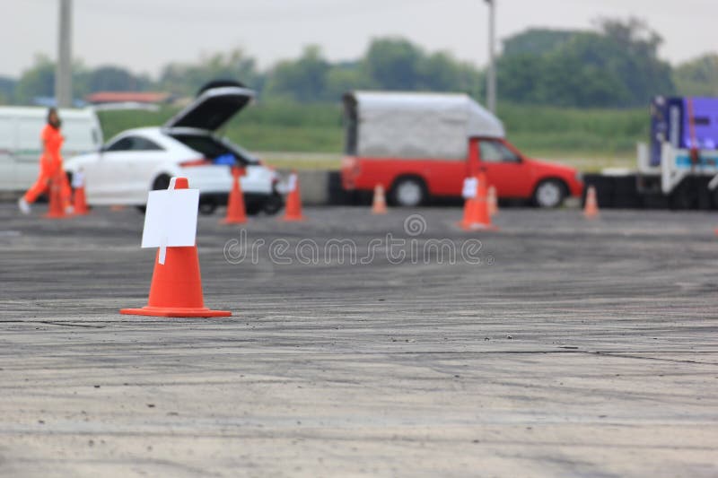 Traffic Cone on the Race Track with Tire Tracks Stock Image - Image of ...