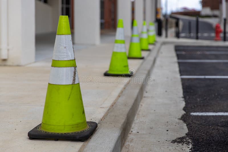 Traffic Cones Line Up in a Parking Lot Stock Image - Image of curb ...