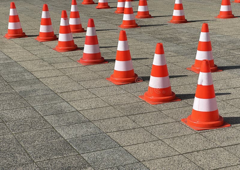 Traffic Cones on the Paving Stone Area Stock Photo - Image of sign ...