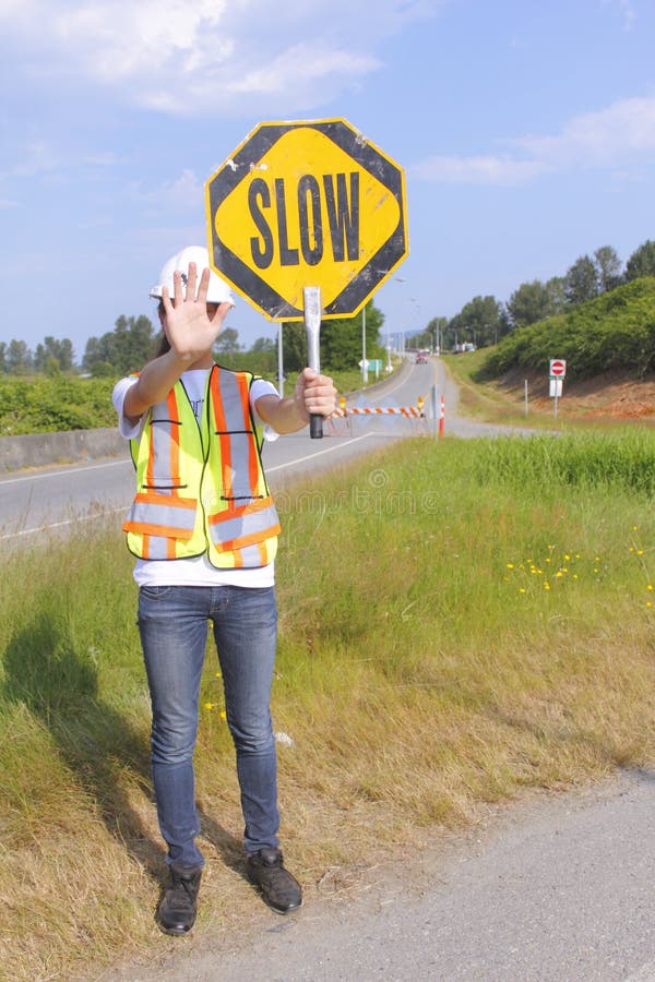 Traffic Controller Slowing Traffic Stock Image - Image of control, slow ...