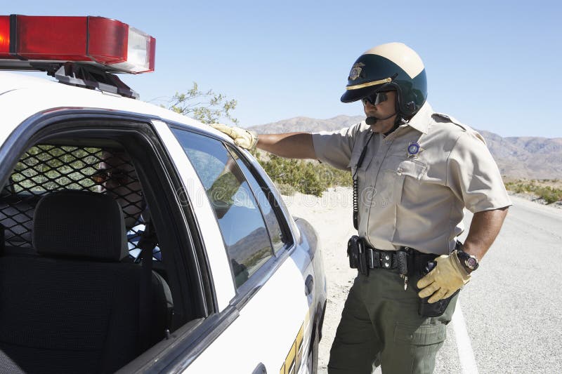 Mature Traffic Cop Holding License Stock Image - Image of person, aged ...