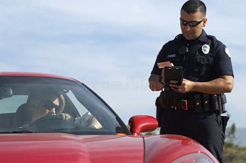Traffic Cop by Sports Car stock image. Image of horizontal - 29660073