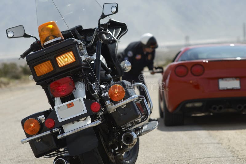 Traffic Cop by Motorcycle stock image. Image of middle - 32031523