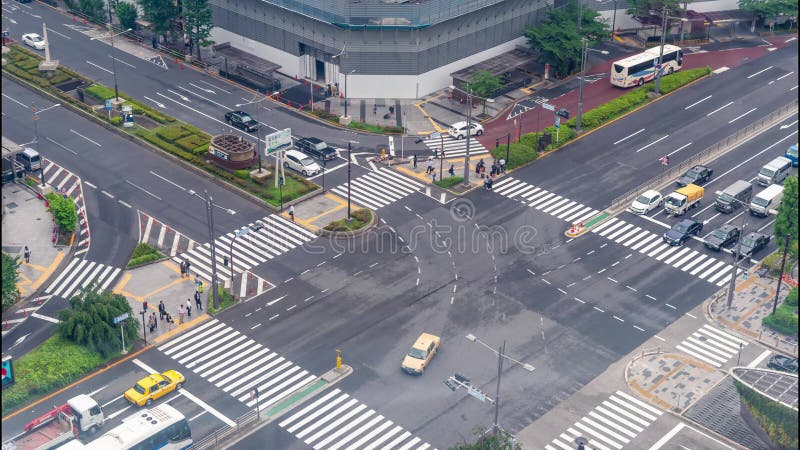 Traffic Crosses a Busy Intersection in Tokyo, Japan Stock Footage ...