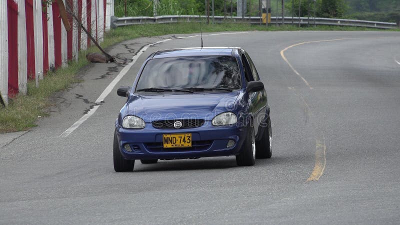 Compact Car Driving on Road Editorial Image - Image of nation, sedans ...