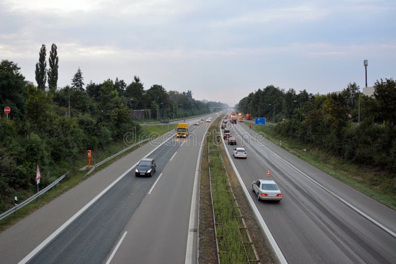 Traffic on the Expressway. in the Background, a Remote Control of the ...