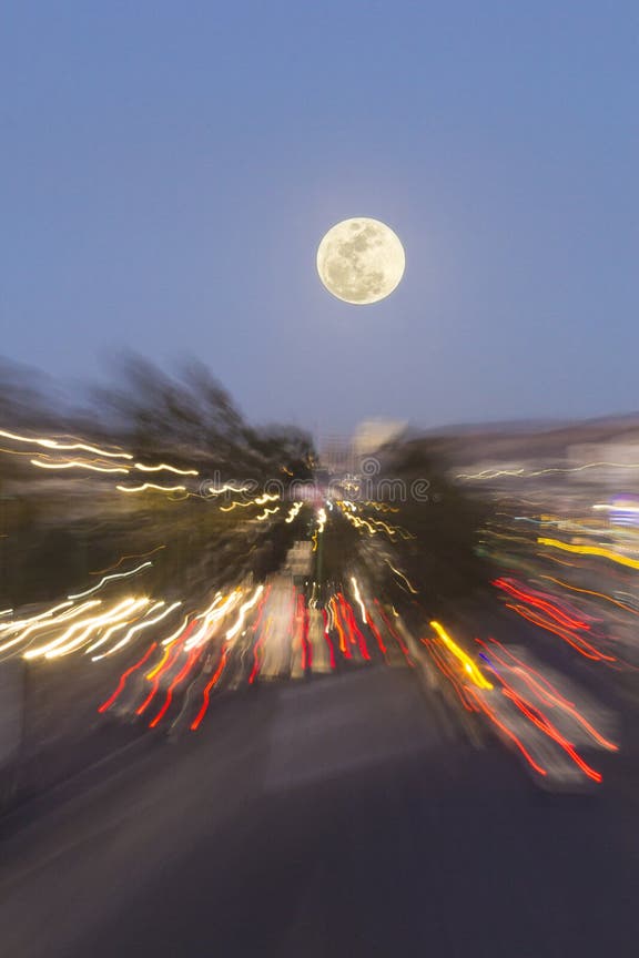 Traffic and full moon stock image. Image of blur, automobile - 65620775
