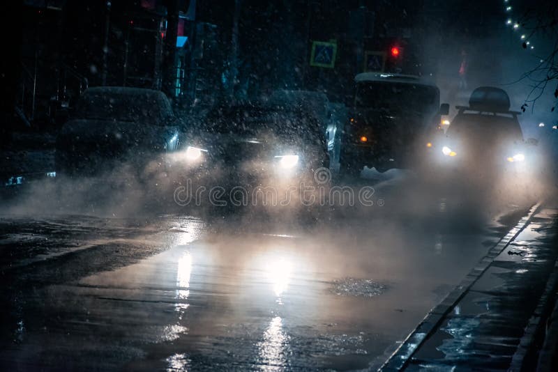 Traffic on a Heavy Snowfall and Rainy Night Stock Image - Image of ...