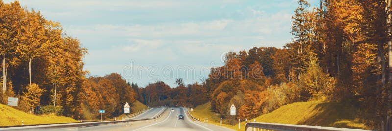 Traffic in High Speed on a Highway through Rural Landscape on Sunset ...