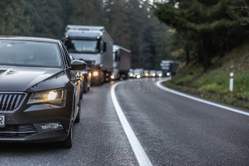 Traffic Jam on a Mountain Road after Several Vehicles Collided in Front ...