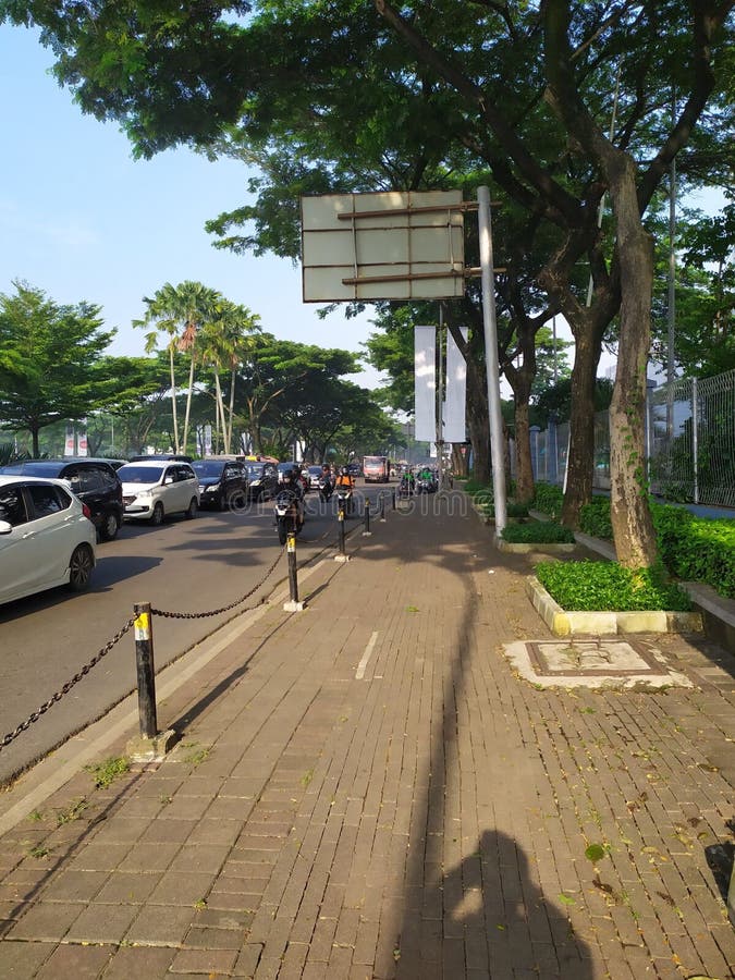 Traffic Jammed Light Intersection at Night after Rain in Indonesia ...