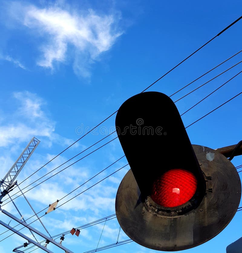 Traffic Light on the Background of Blue Sky with White Clouds. Stock ...