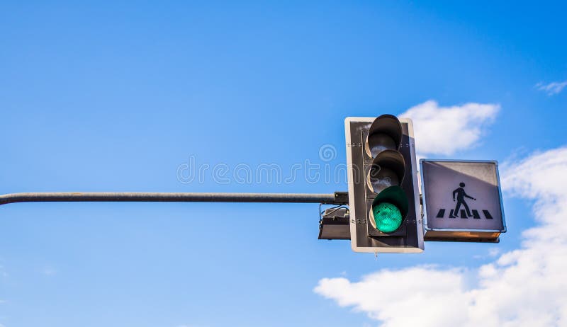 Traffic Light in Front of Blue Sky Stock Photo - Image of sign, green ...