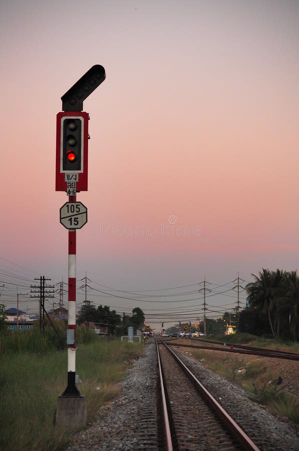 Traffic light on railway stock image. Image of sunset - 40749107