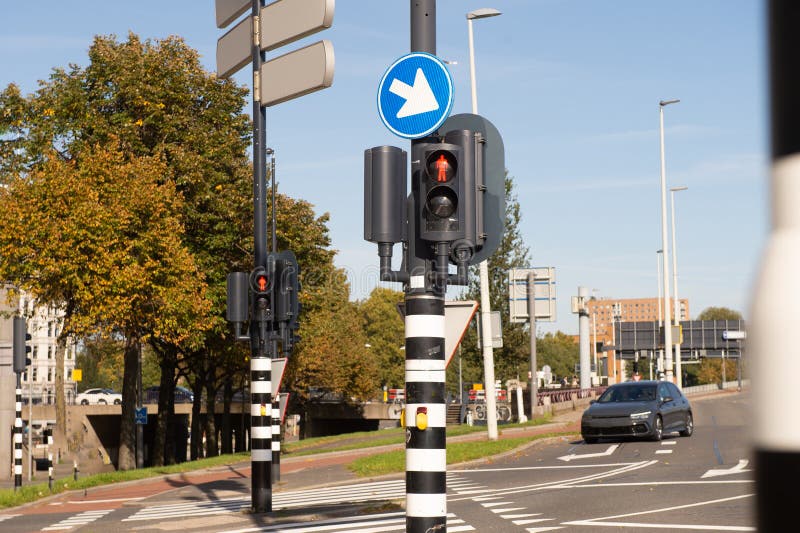 Traffic Light-regulated Intersection with Road Signs. Red Traffic Light ...