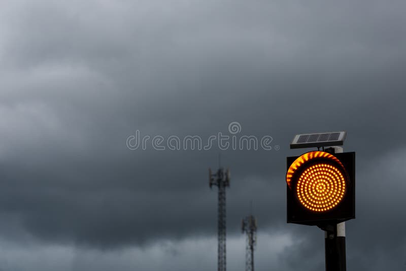 Traffic Light with Solar Cell Panel on the Top Against Stormy Cloud ...