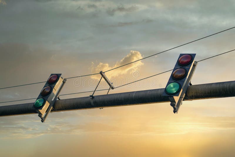 Traffic Lights with Green Light on Horizontal Pole on Cloudy Sunset Sky ...