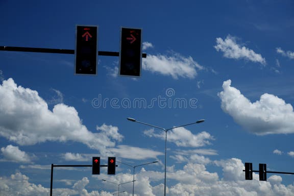 Traffic Lights on an Intersection in Thailand on a Blue Sky Background ...