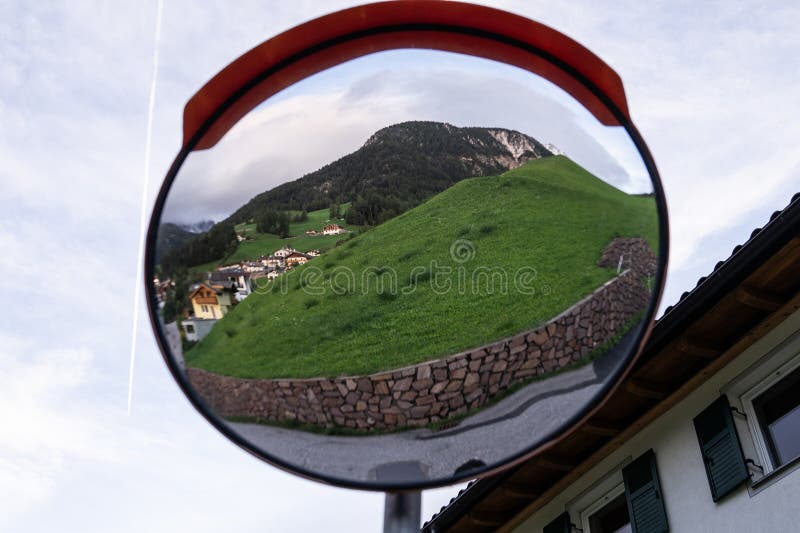 Traffic Mirror at Intersection or Curve of Road with View of Dolomites ...