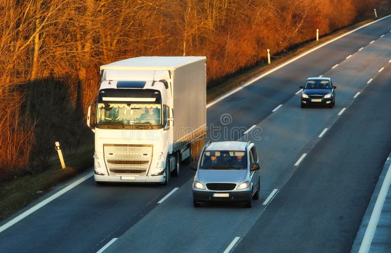 Traffic on the Move at Sunset, Transportation in Highway Stock Image ...