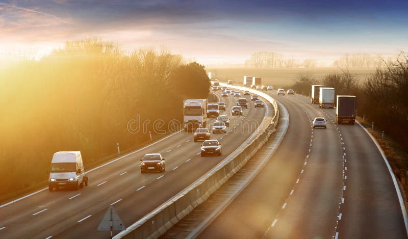 Traffic on the Move at Sunset, Transportation in Highway Stock Image ...