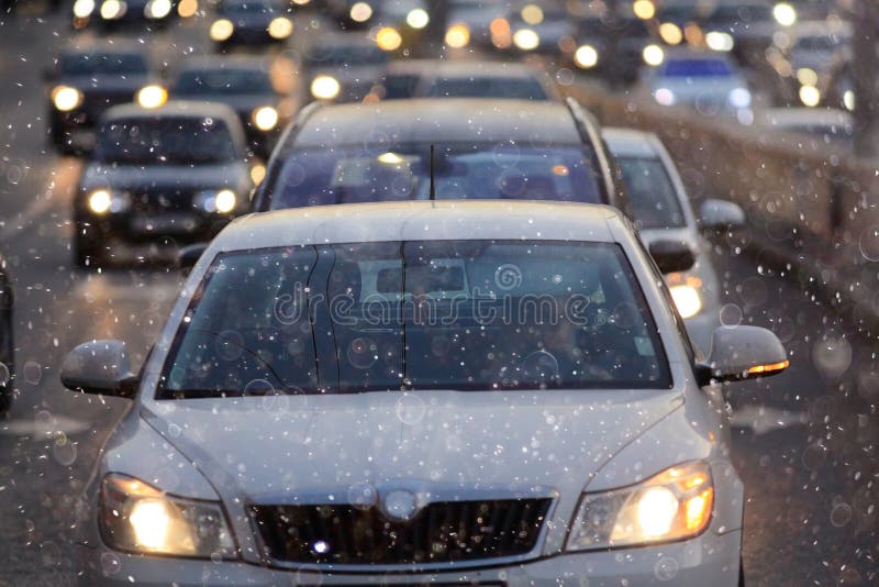 Traffic Road with Fallen Snow Stock Photo - Image of light, illuminated ...