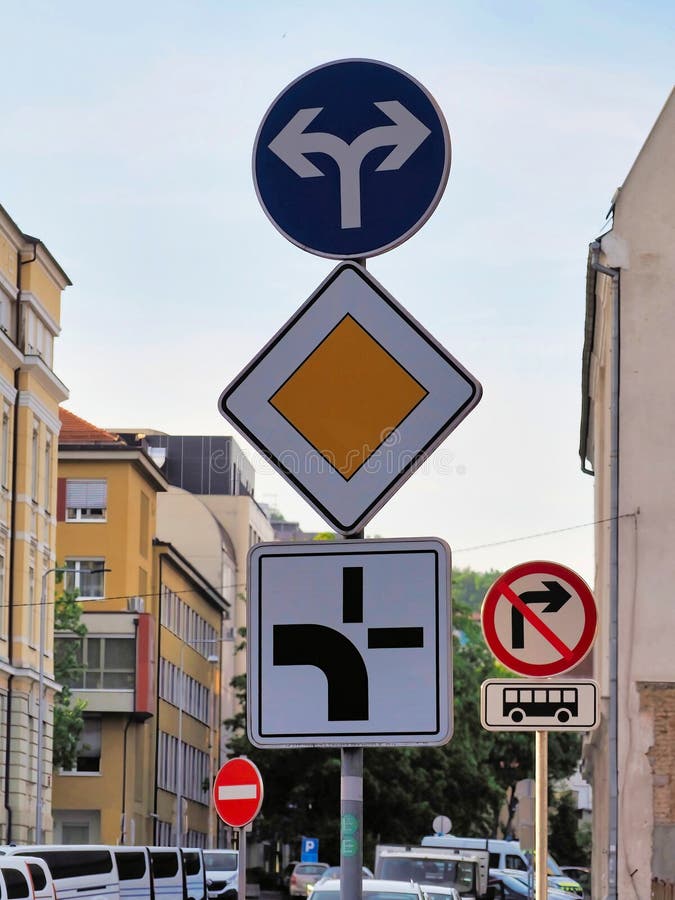 Several Road Signs in Public Road at Intersection Stock Photo - Image ...