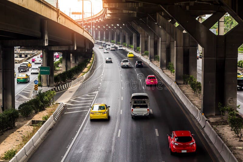 Traffic on Road Under the Freeway. Stock Image - Image of candle, bulb ...
