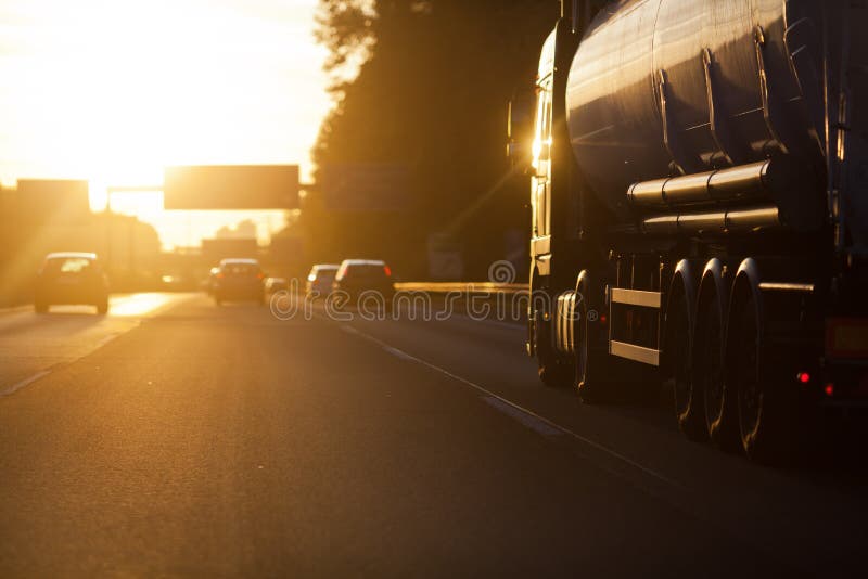 Traffic scene at sunset stock photo. Image of markings - 27226682