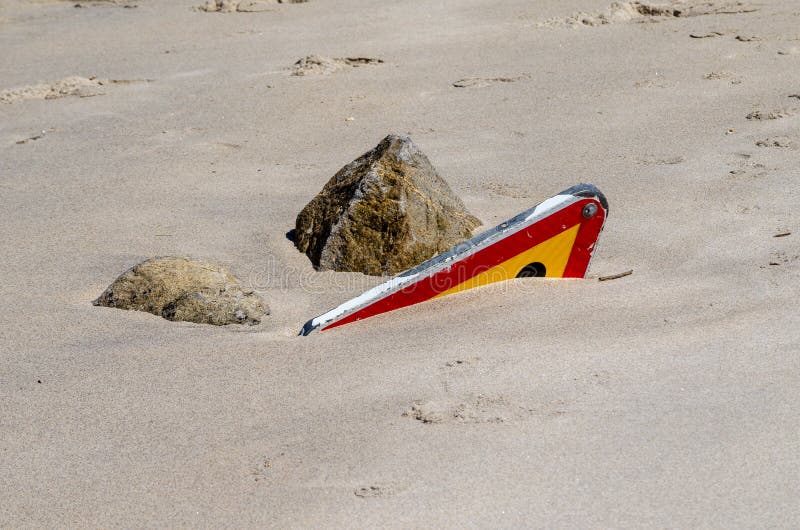Traffic Sign Buried in the Sand on the Beach Stock Image - Image of ...