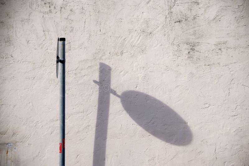 Traffic sign casts shadows stock image. Image of casts - 92488497