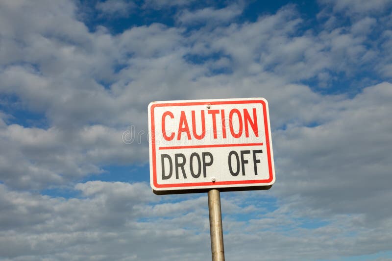 Traffic Sign Caution Drop Off Under Blue Sky Stock Image - Image of ...