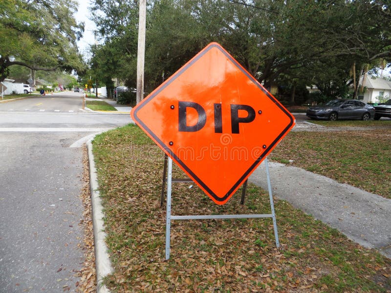 Dip Road Sign stock image. Image of yellow, black, background - 52610473