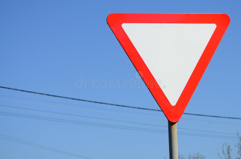 Traffic Sign in the Form of a White Triangle. Give Way Stock Photo ...