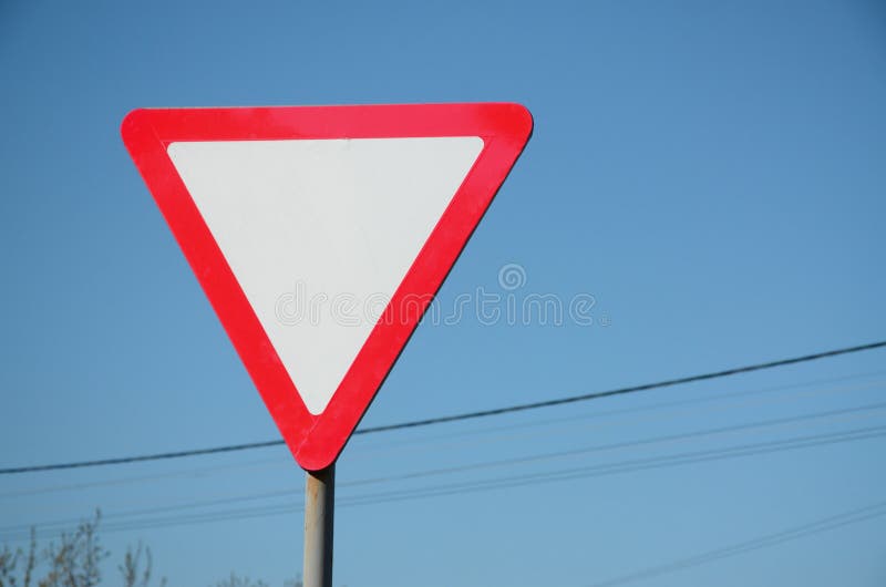 Traffic Sign in the Form of a White Triangle. Give Way Stock Photo ...
