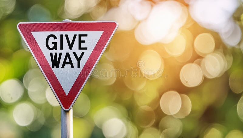 Traffic Sign Give Way on Natural Green Blurred Backdrop Stock ...
